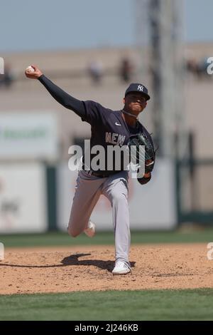 New York Yankees' Luis Gil, left, and Andy Pettitte, right, look on ...
