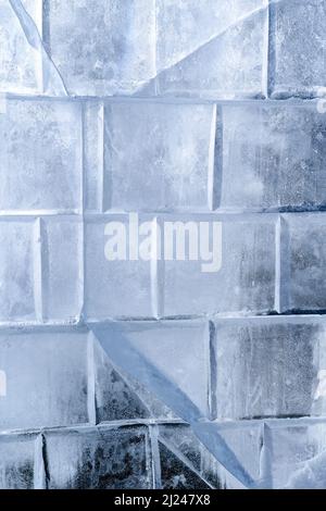 A translucent block of ice frozen in the shape of a heart sitting on a ...