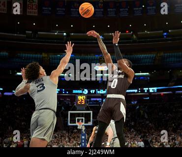 Xavier guard Colby Jones (3) shoots past DePaul's David Jones (32 ...