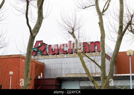 This photograph shows the sign of a Auchan store at Velizy Villacoublay ...