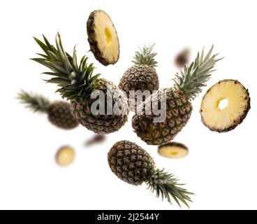 Ripe pineapples levitate on a white background Stock Photo - Alamy