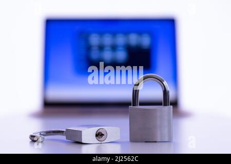 Privacy and data protection: Laptop with unlocked padlock Stock Photo ...