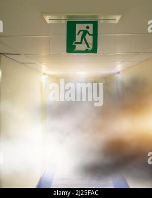 emergency exit door inside of a building Stock Photo - Alamy
