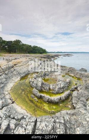 Fossil sand volcano Praestens badkar. Baltic Sea, Scania, Sweden Stock ...