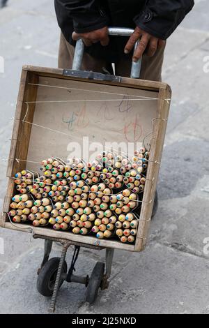 Man selling pencils in Quito, Ecuador Stock Photo - Alamy