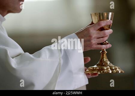 Catholic priest. Eucharist celebration in church Stock Photo - Alamy