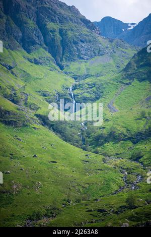 River flowing between hills and village in rural areas. Landscape Stock ...