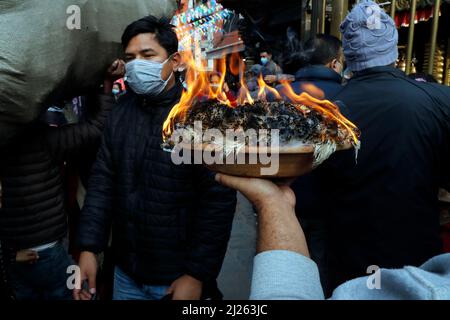 Hindu performing a fire ritual at Durbar Square Stock Photo - Alamy