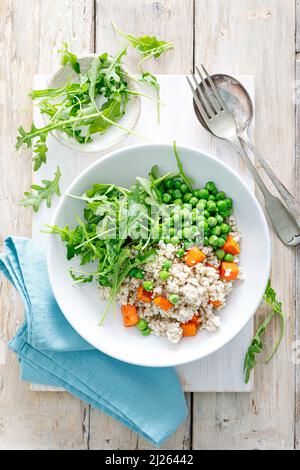 Barley porridge with green peas, baked pumpkin and fresh arugula salad ...