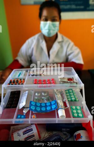 Infirmary in a primary school. Nurse with medicines for children Stock ...