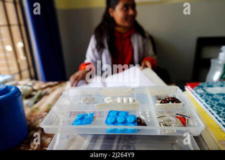 Infirmary in a primary school. Nurse with medicines for children Stock ...
