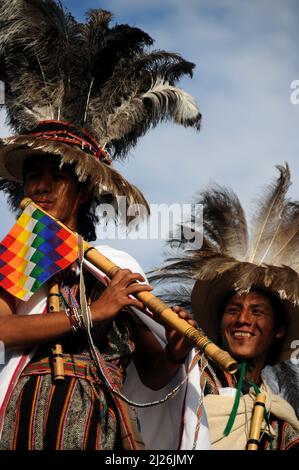 Inti Raymi, festival of the sun, musicians with siku, pan flute, ruins ...