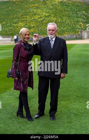 Queen drummer Roger Taylor with his wife Sarina, after being made an ...