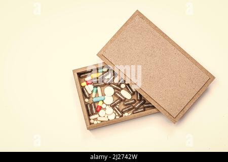 Advanced medicine for pain. Pill case isolated on white. Open pill box ...
