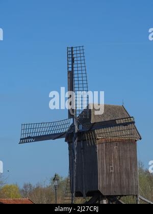windmill and church in westphalia Stock Photo - Alamy
