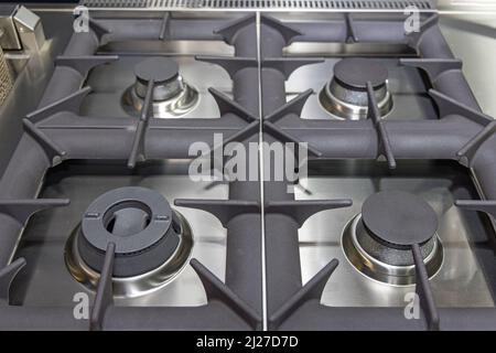 Gas Burning Stove Top With Four Brass Burners Hubs Stock Photo - Alamy