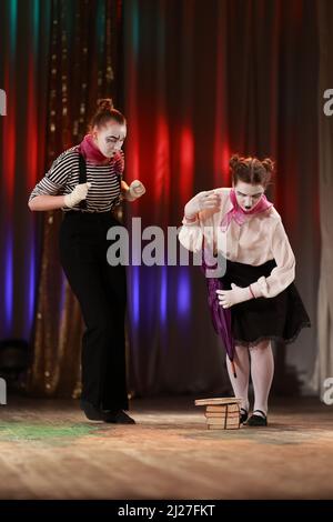 Actress girls clowns show performance on stage Stock Photo - Alamy