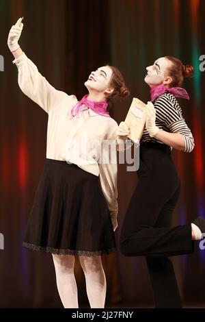 Actress girls clowns show performance on stage Stock Photo - Alamy