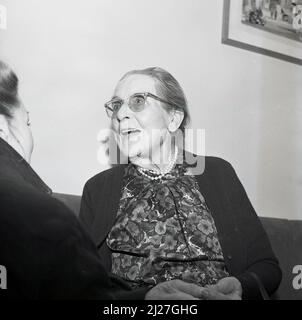 1965, historical, a centenarian (100 years old) lady being interviewed ...