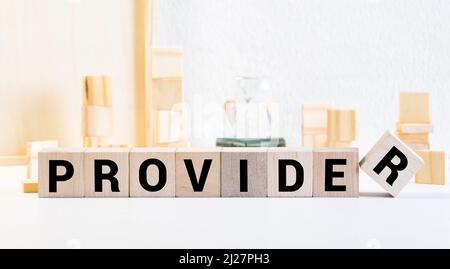 Word provider made with wood building blocks Stock Photo - Alamy