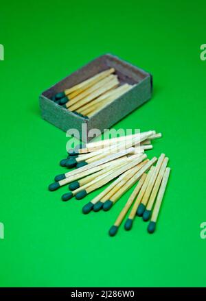Matches in a cardboard matchbox on white paper background Stock Photo ...