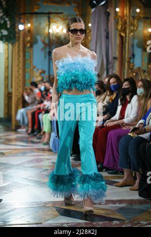 A model showcases Pomeline design during the Atelier Couture bridal ...