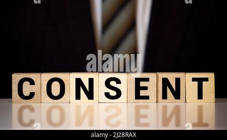 Consent - word from wooden blocks with letters, consent concept, on ...