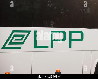 Picture of a LPP bus with its logo on a platform in Ljubljana bus ...