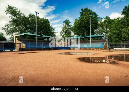 Wet baseball field after a rain storm Stock Photo - Alamy
