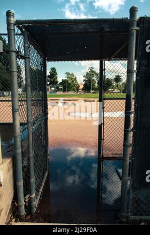 Wet baseball field after a rain storm Stock Photo - Alamy