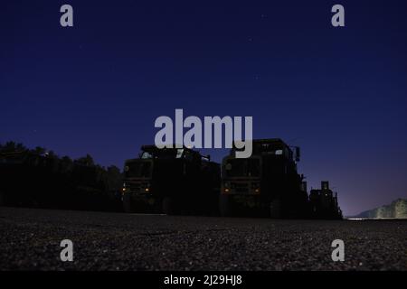 Several Bobtail truck tractors and enhanced heavy equipment trailers ...