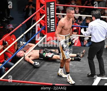 Andy Hiraoka (black glove) and Cristiano Aoqui (silver glove) competes ...
