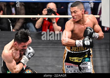 Andy Hiraoka (black glove) and Cristiano Aoqui (silver glove) competes ...