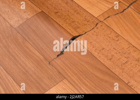 Broken torn linoleum old rubber polymer PVC floor damage material ...