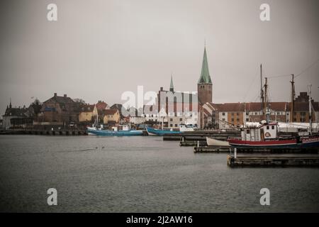 The city of Helsingor, Denmark located along the shoreline of the ...