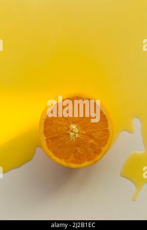 Spilled orange juice, creative photography Stock Photo - Alamy