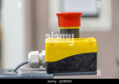 Red Emergency cutoff stop button on a factory machine equipment Stock ...