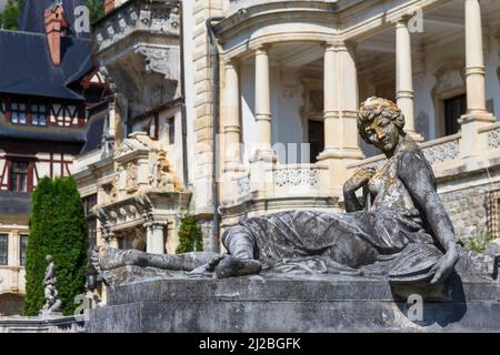Ancient statues at the garden of Peles Castle, one of the most ...
