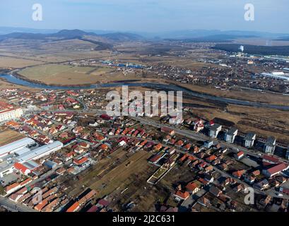An aerial view of Reghin city with many buildings in Romania Stock ...