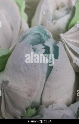 Homemade marshmallows of different shapes and colors. Zephyr flowers ...