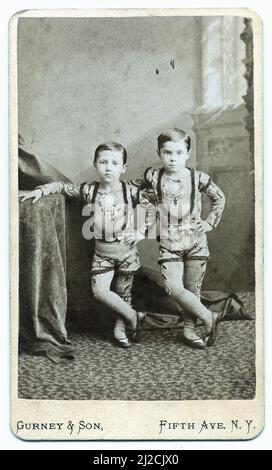 Children dressed in Victorian-era clothing are seen playing, a common ...
