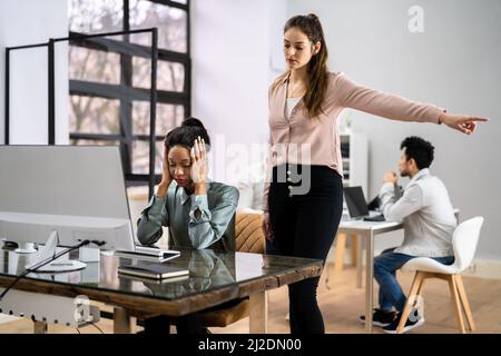 Boss Firing Female Employee In Modern Office Stock Photo - Alamy