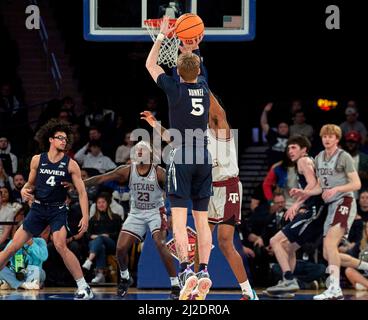 Xavier guard Adam Kunkel shoots a free throw during the second half of ...