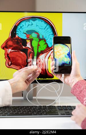 human brain inside a computer monitor Stock Photo - Alamy