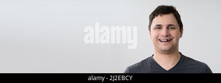 Portrait of man with missing front tooth Stock Photo - Alamy