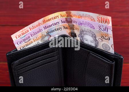 Cayman Islands money - dollar in the black wallet Stock Photo - Alamy