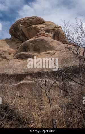 Vertical shot of big rock in one of the natural Outback in Australia ...