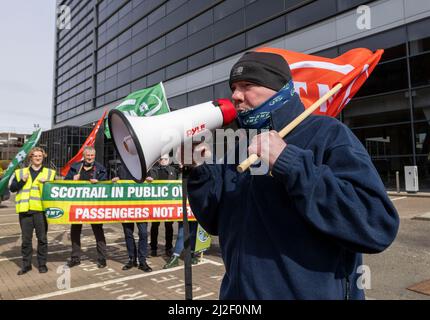 RMT Regional Organiser Mick Hogg, speaks outside Glasgow Queen Street ...