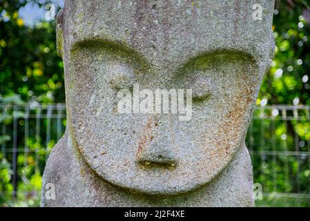 This megalithic statue is called Langkebulawa by the local people. It ...