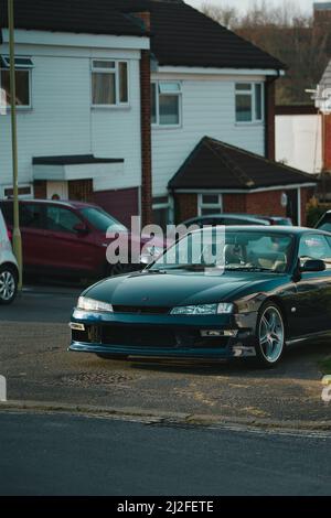 The vertical shot of a Nissan s15 car parked on a street side Stock ...